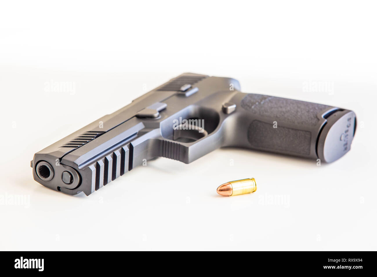 New handgun white background isolated close up Stock Photo - Alamy