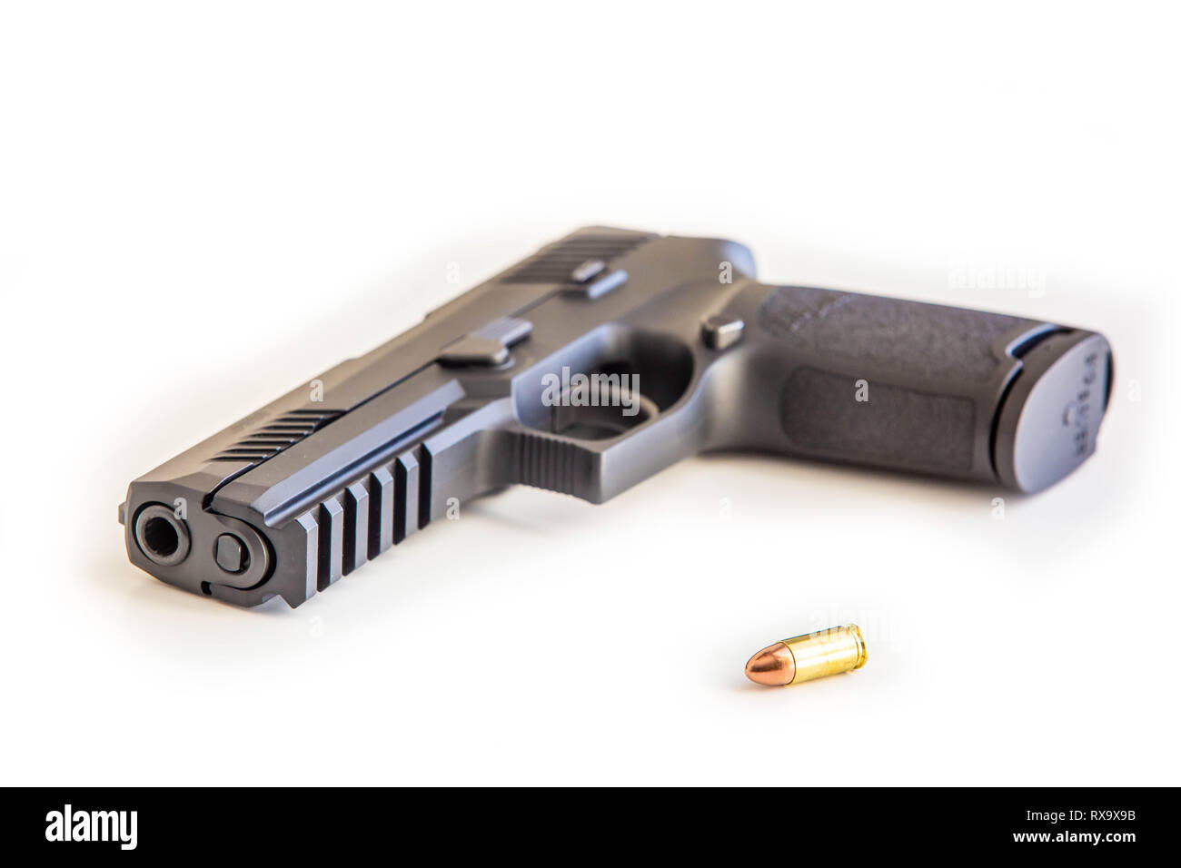 New handgun white background isolated close up Stock Photo - Alamy