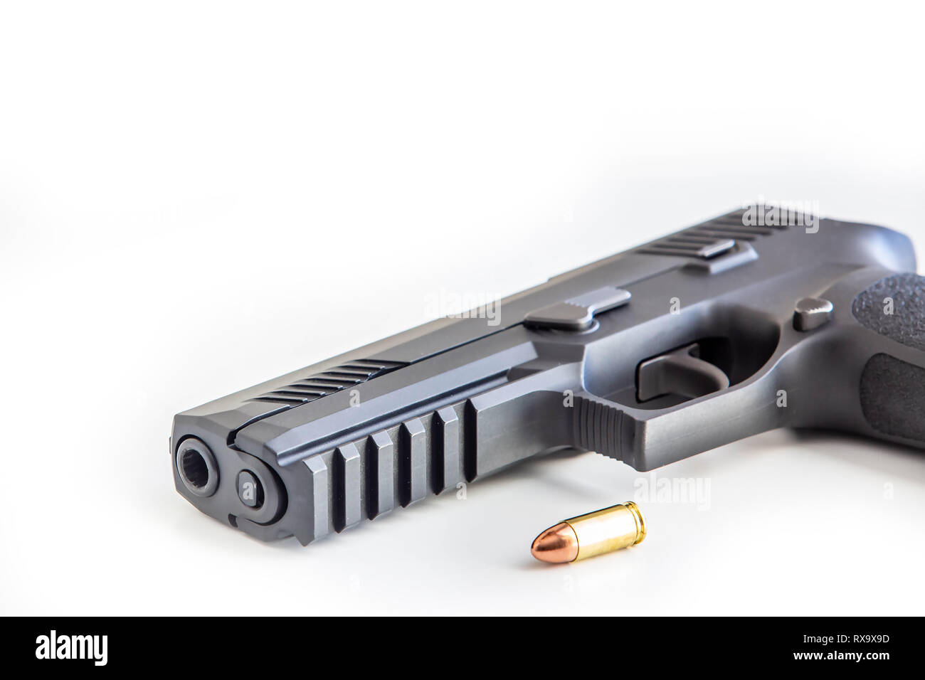 New handgun white background isolated close up Stock Photo - Alamy