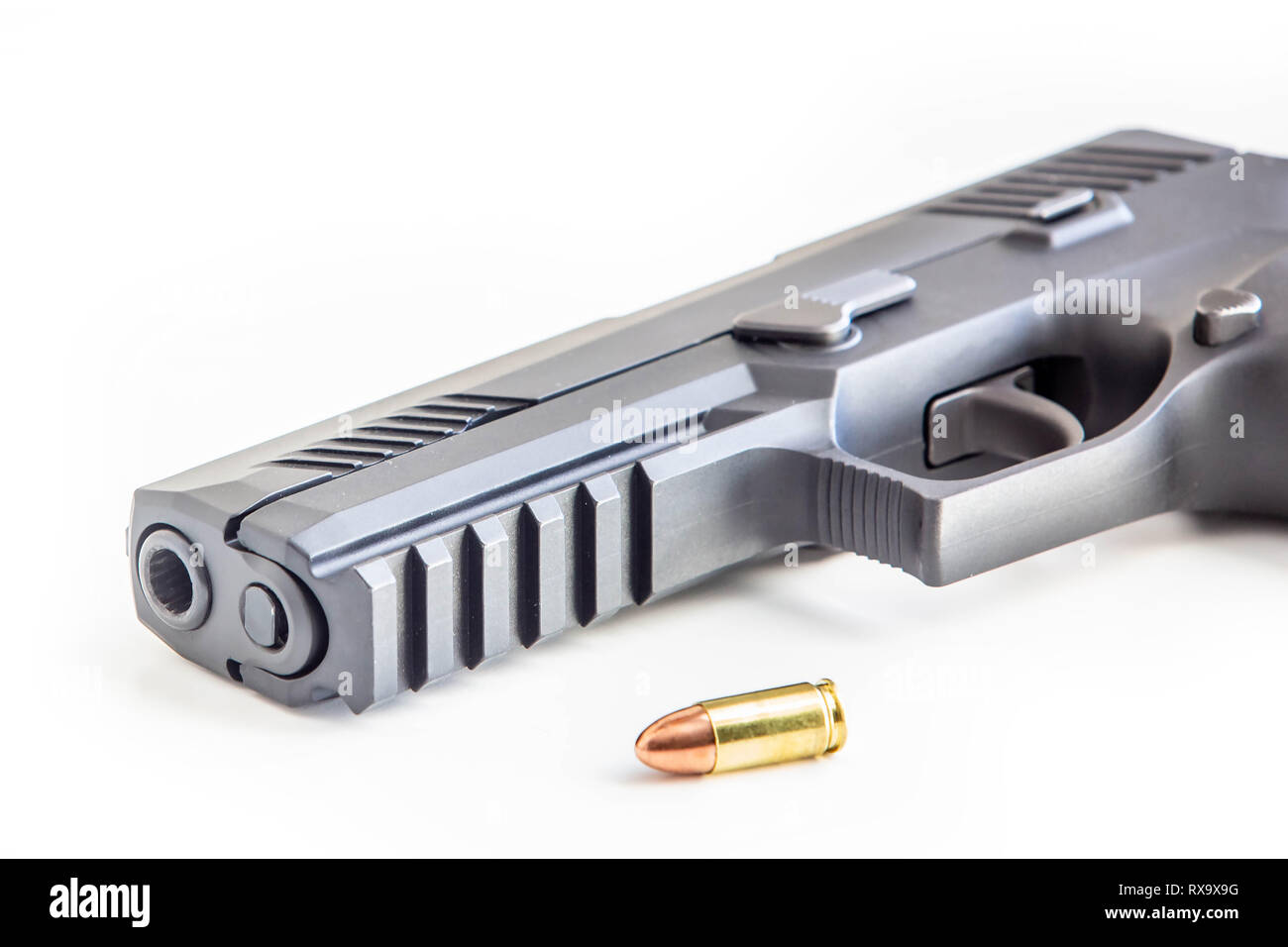 New handgun white background isolated close up Stock Photo - Alamy