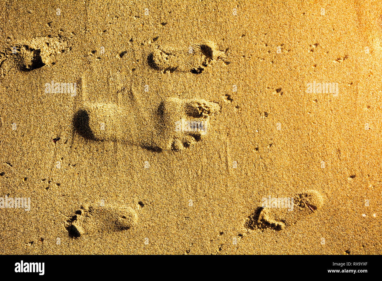 Adult child footprints in sand hi-res stock photography and images - Alamy