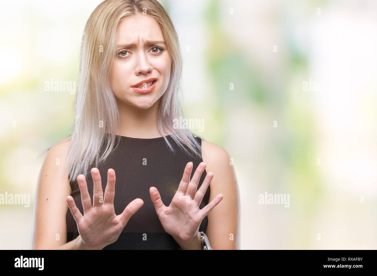 Young blonde woman over isolated background disgusted expression ...
