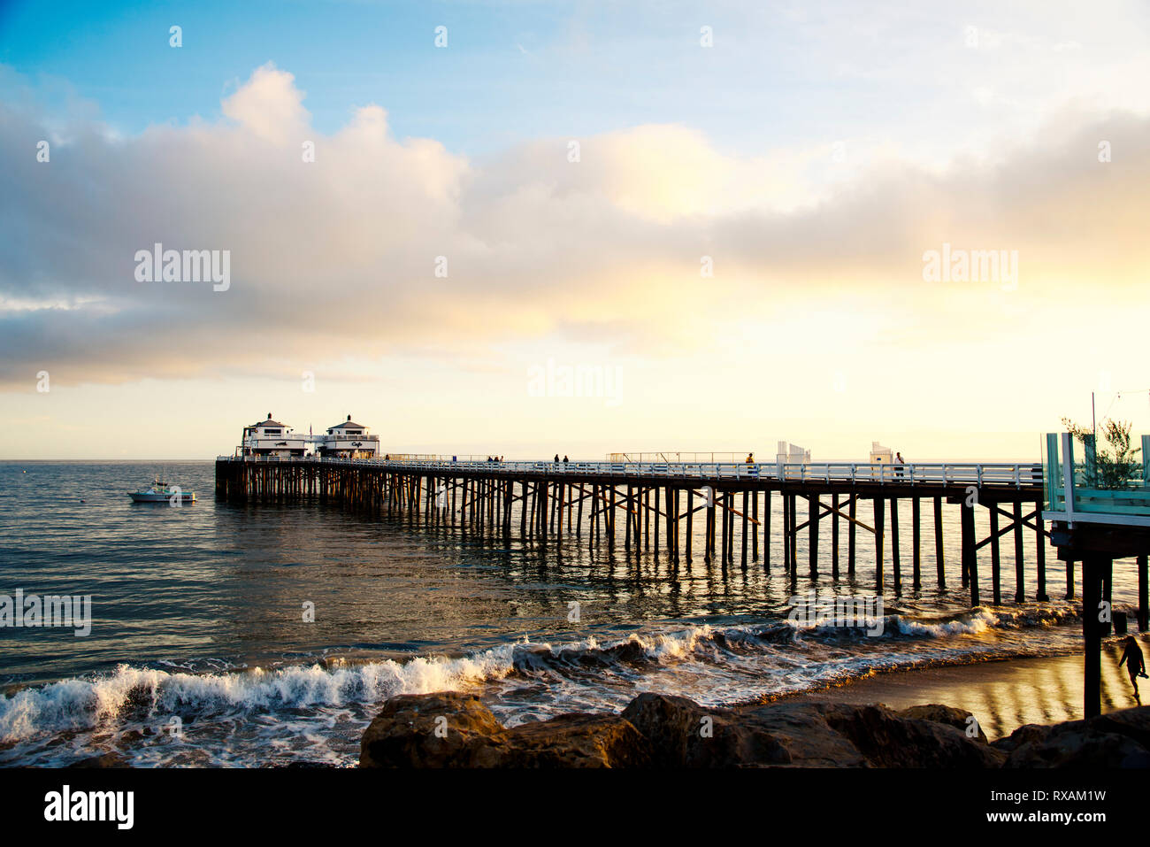 Malibu pier during a beautiful sunset with a surreal sky, Exclusive ...