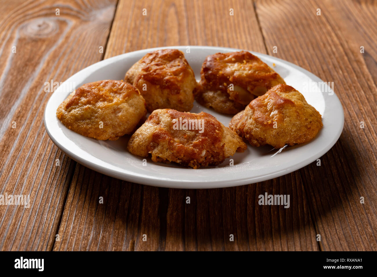 sweet mini chewy cakes or chickee cakes Stock Photo - Alamy