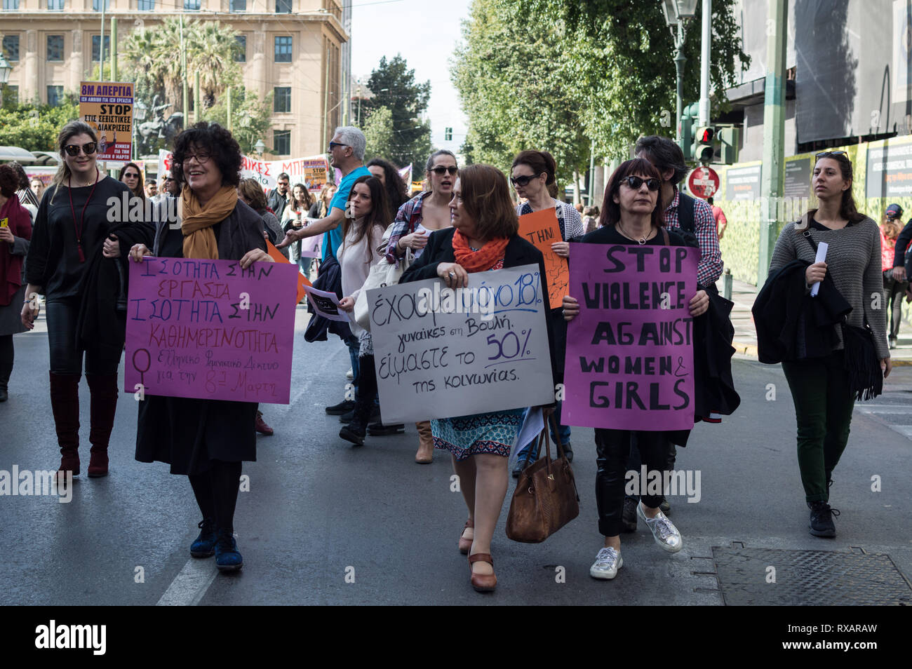 Women seen marching with placards during the protest. Hundreds of ...