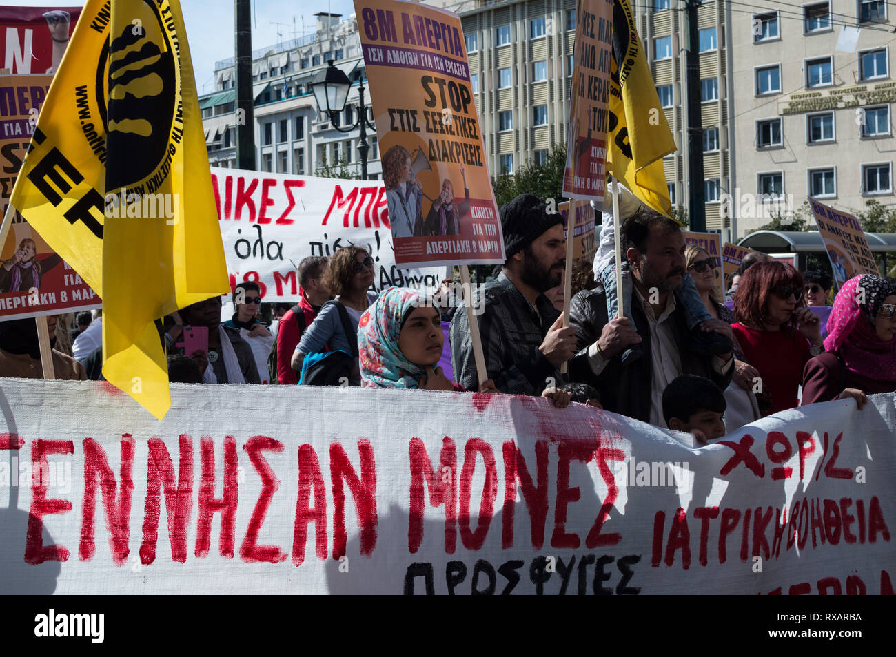 Demonstrators seen marching with a huge banner during the protest ...
