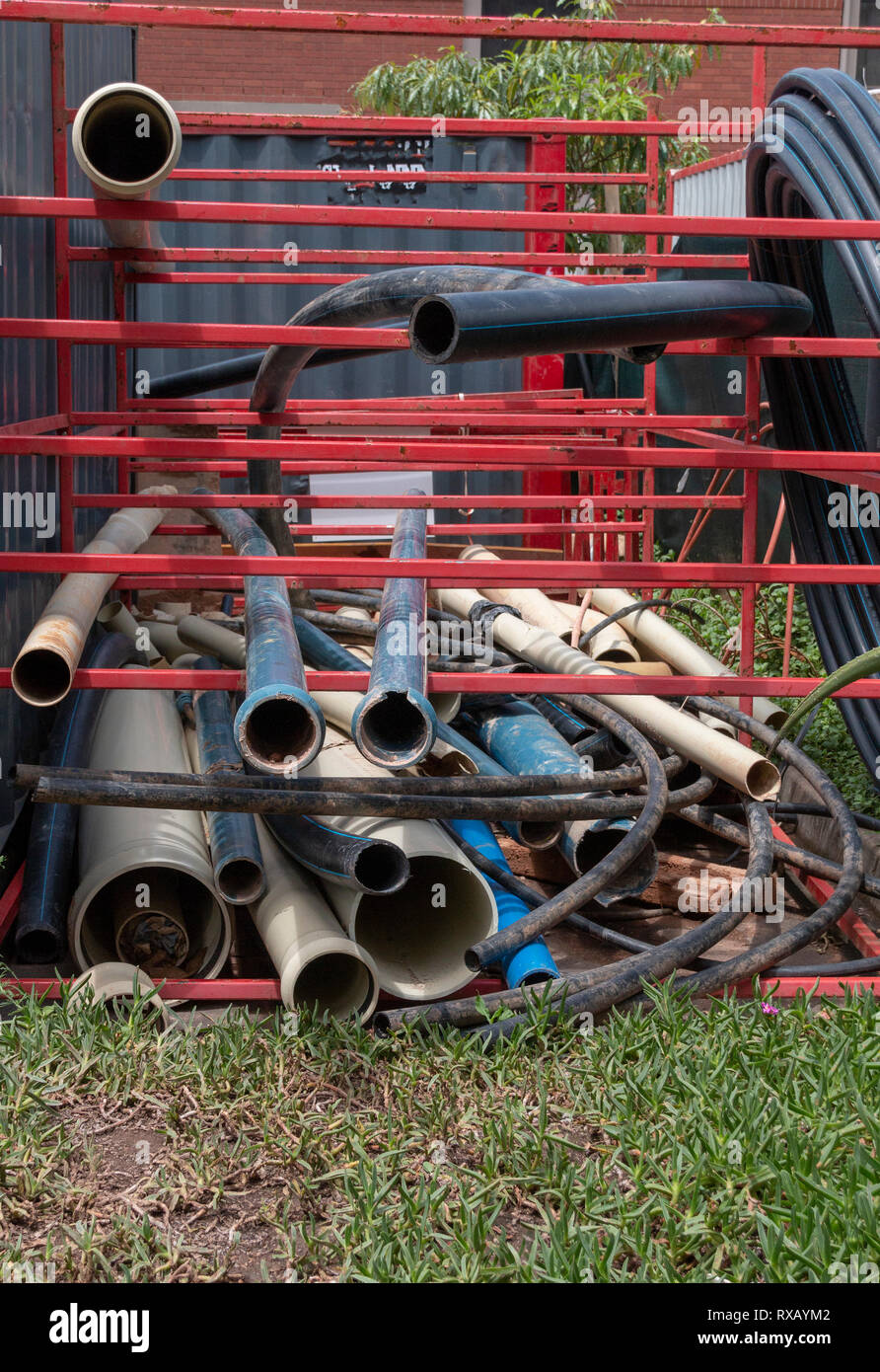A close up view of differnt size and colour piles and cable that is ...