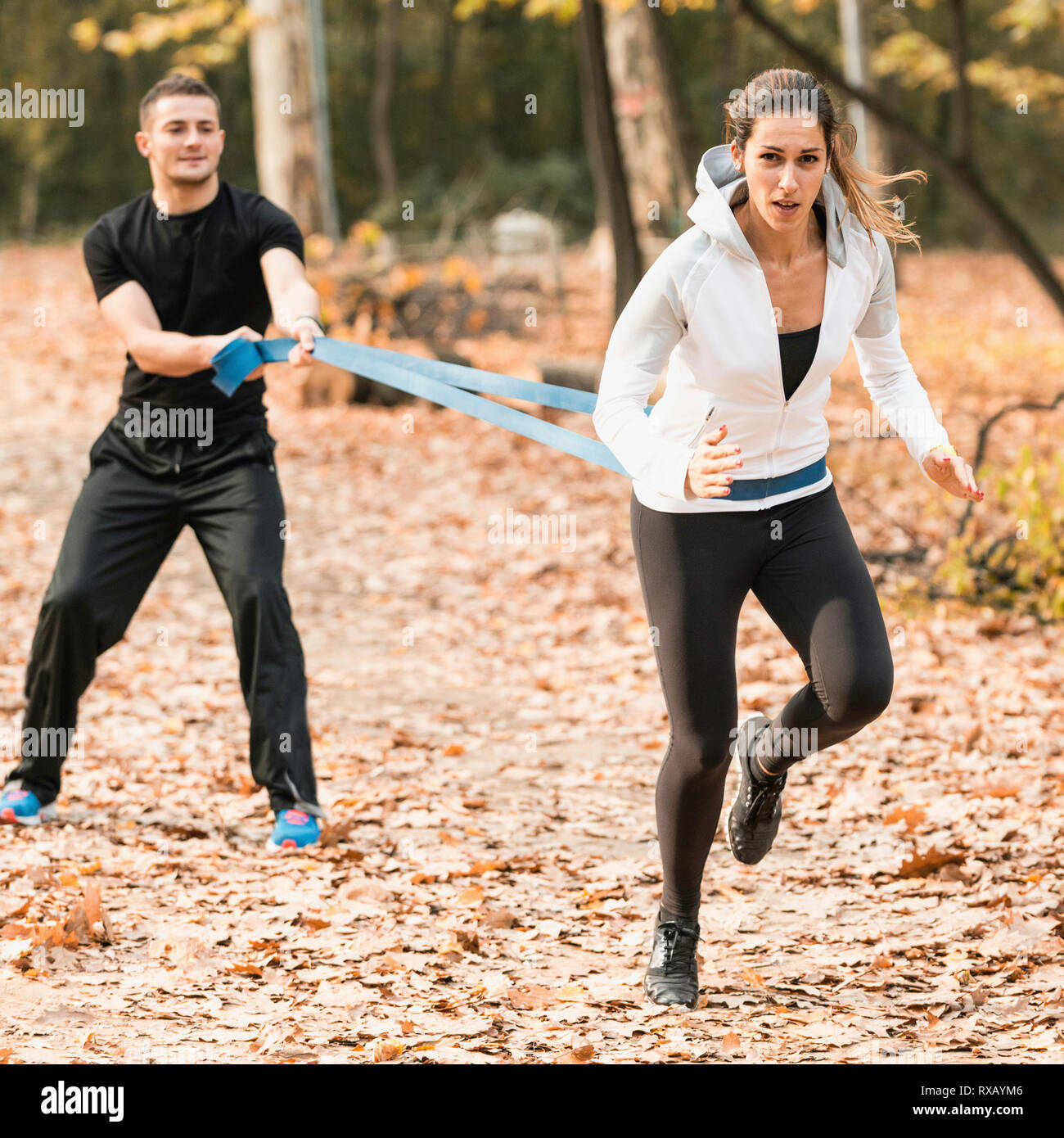 Woman training with coach Stock Photo - Alamy