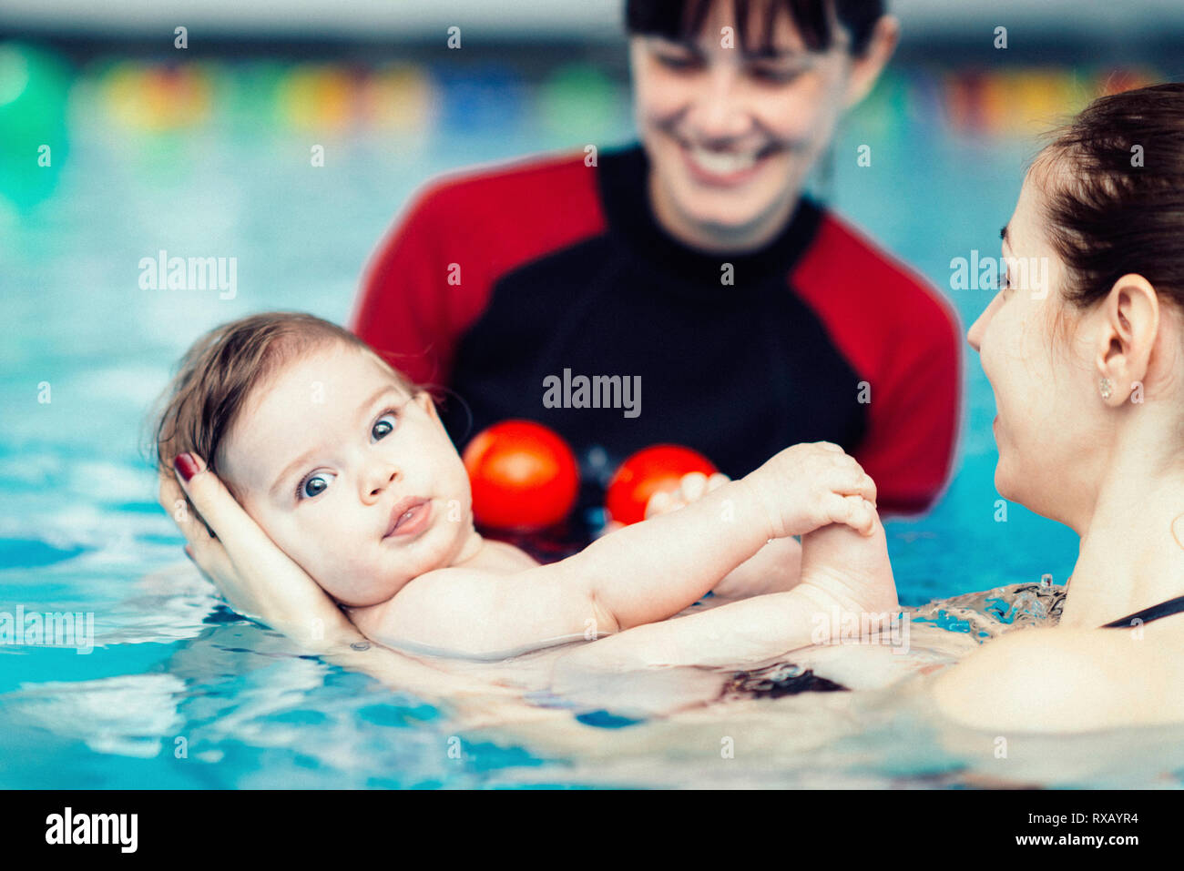 Baby in swimming pool hi-res stock photography and images - Alamy