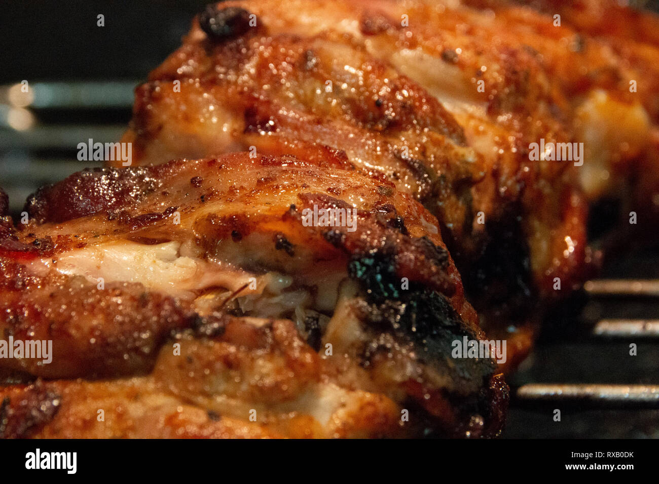 Chicken being cooked hi-res stock photography and images - Alamy