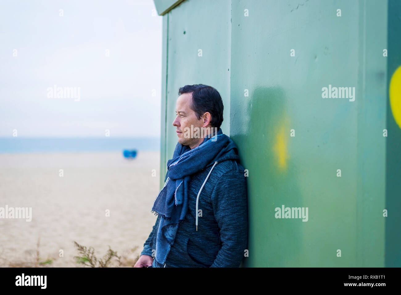 Leaning against building hi-res stock photography and images - Alamy