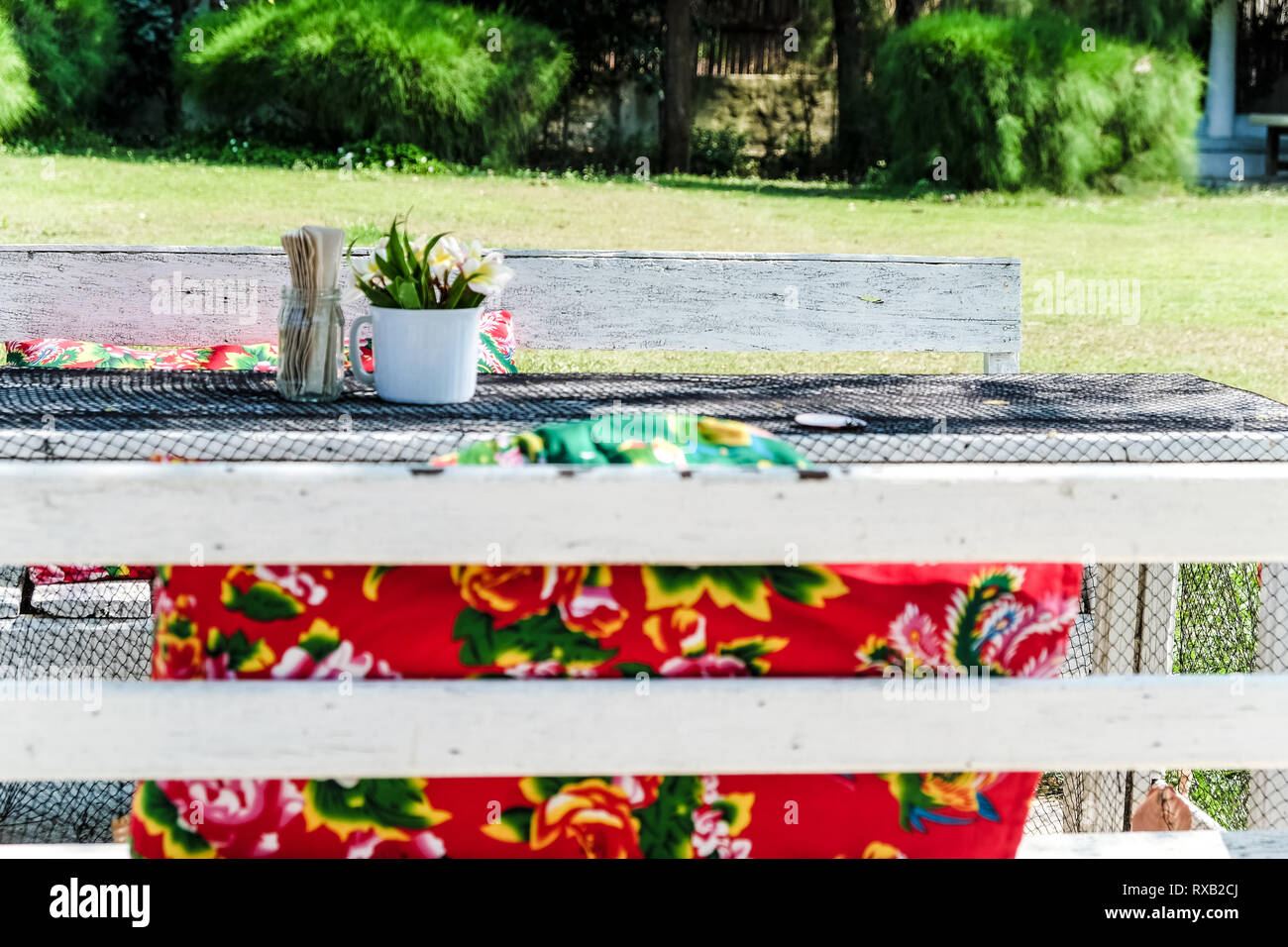 Image of Empty table in the house's garden Stock Photo - Alamy