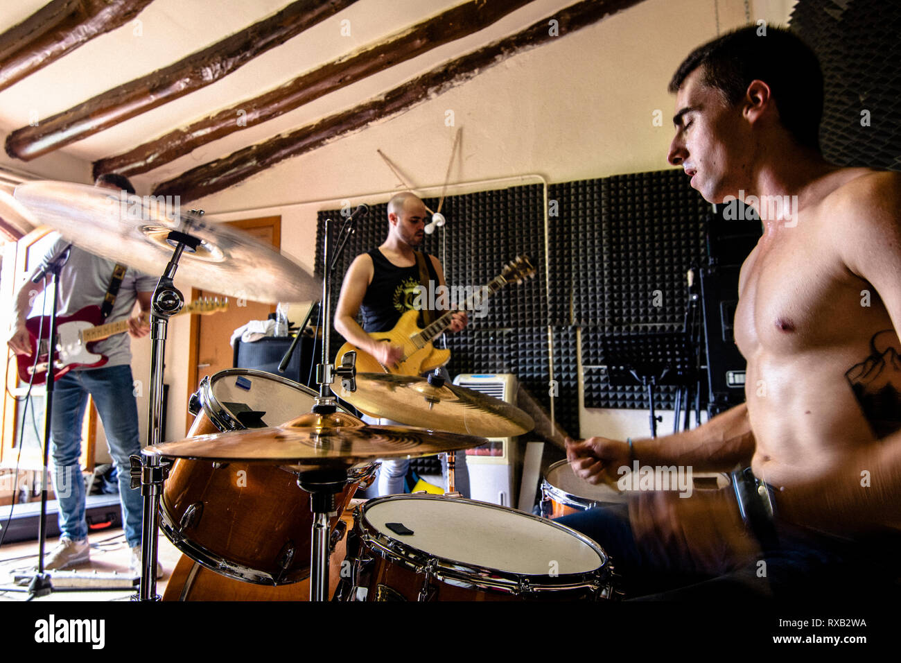 Male musicians practicing in studio Stock Photo - Alamy
