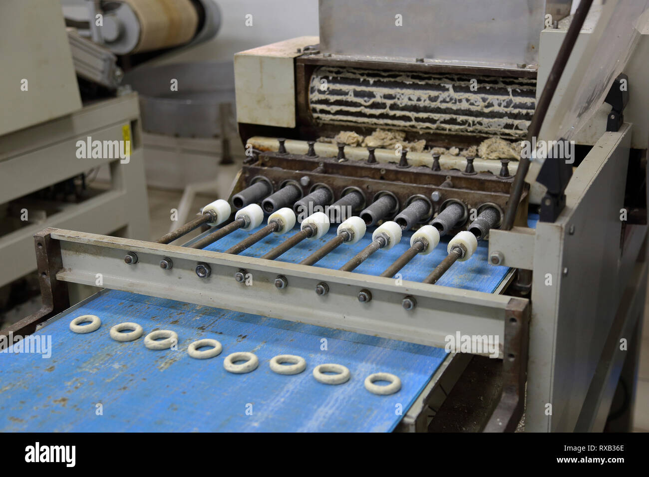 High angle view of sweet food processing on machinery in factory Stock ...