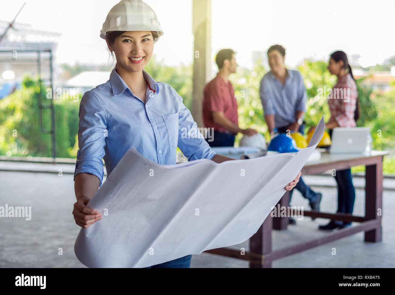 Portrait of Happy professional construction engineer woman working with ...