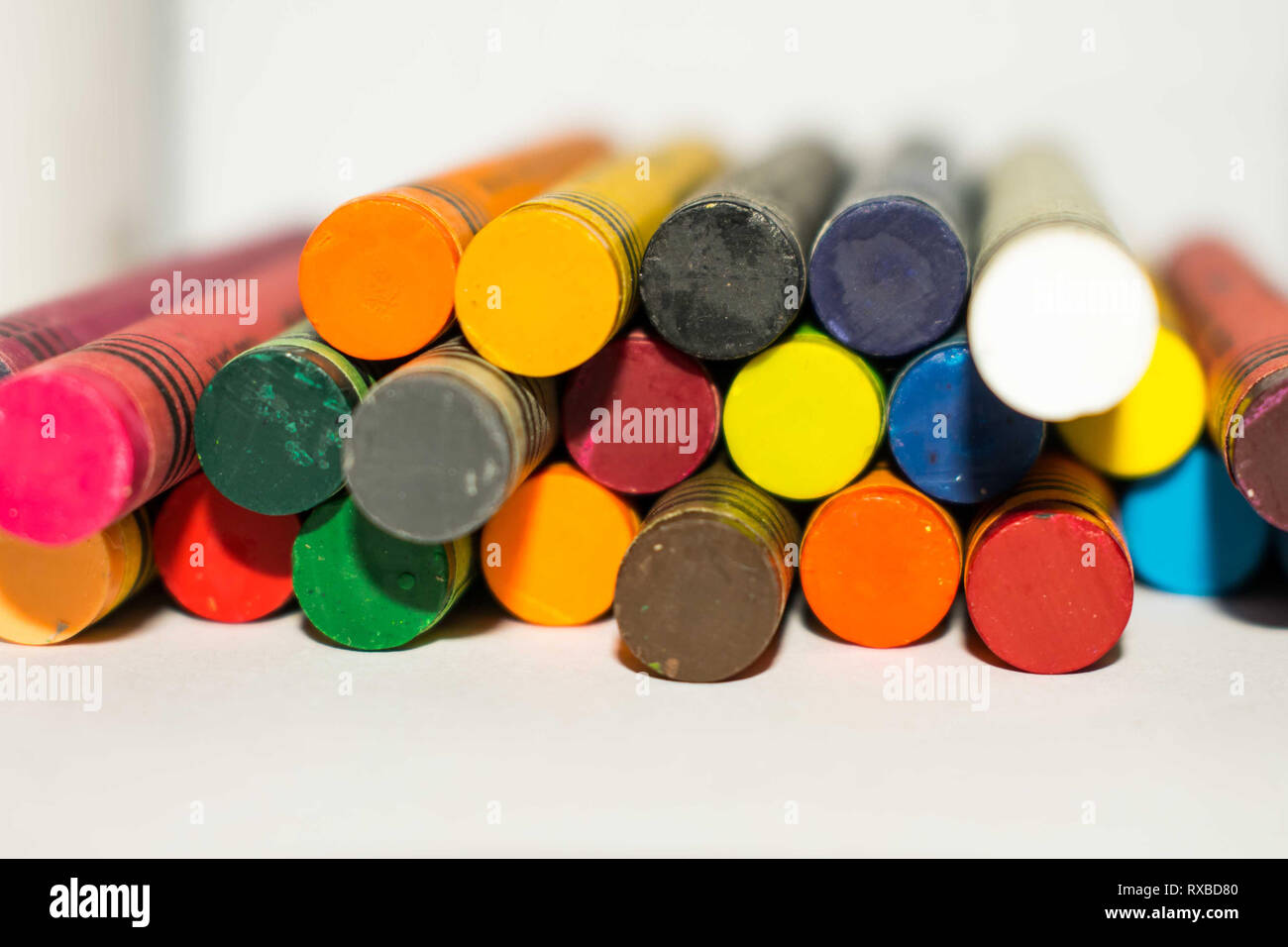 Multi color pastel stacked together with space for text Stock Photo - Alamy