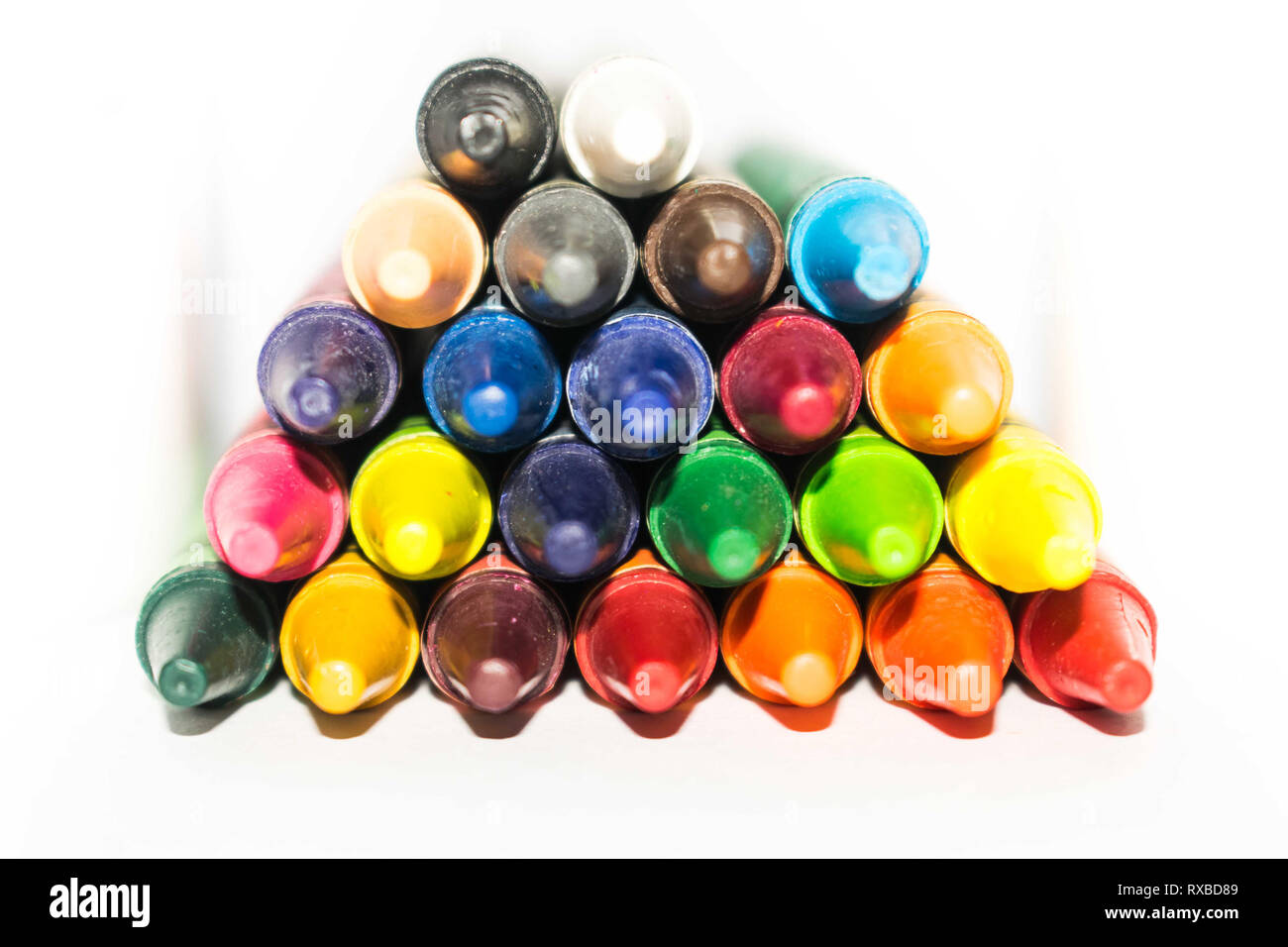 Multi color pastel used for drawing and stacked to form a pyramid Stock ...