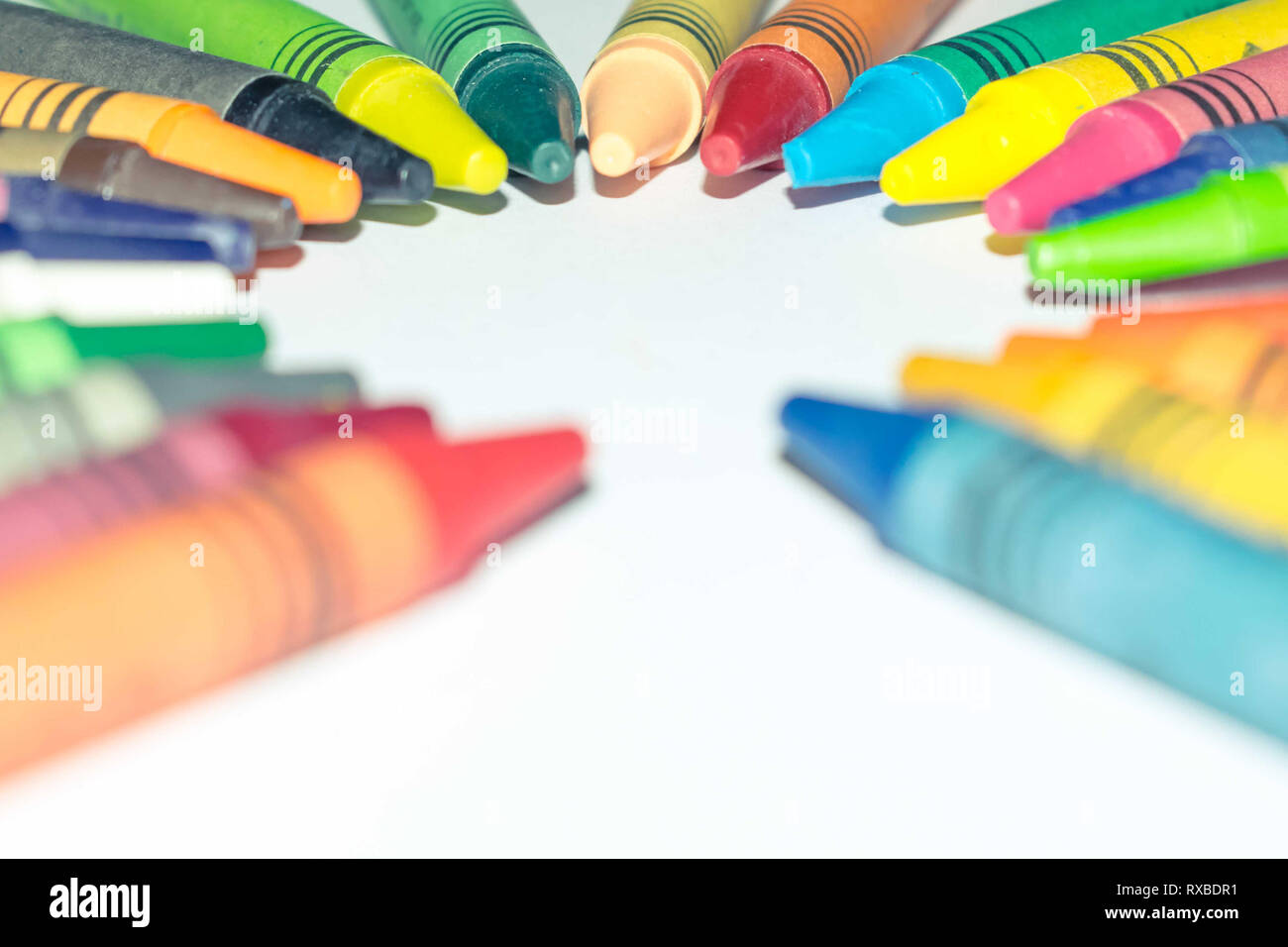 Crayons ready for creative use. Crayons on a white background arranged ...