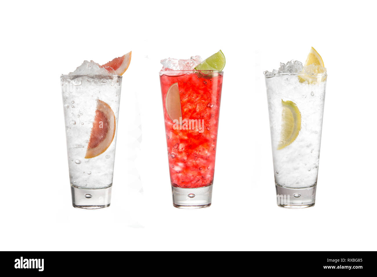 A variety of alcoholic drinks, beverages and cocktails on a white ...