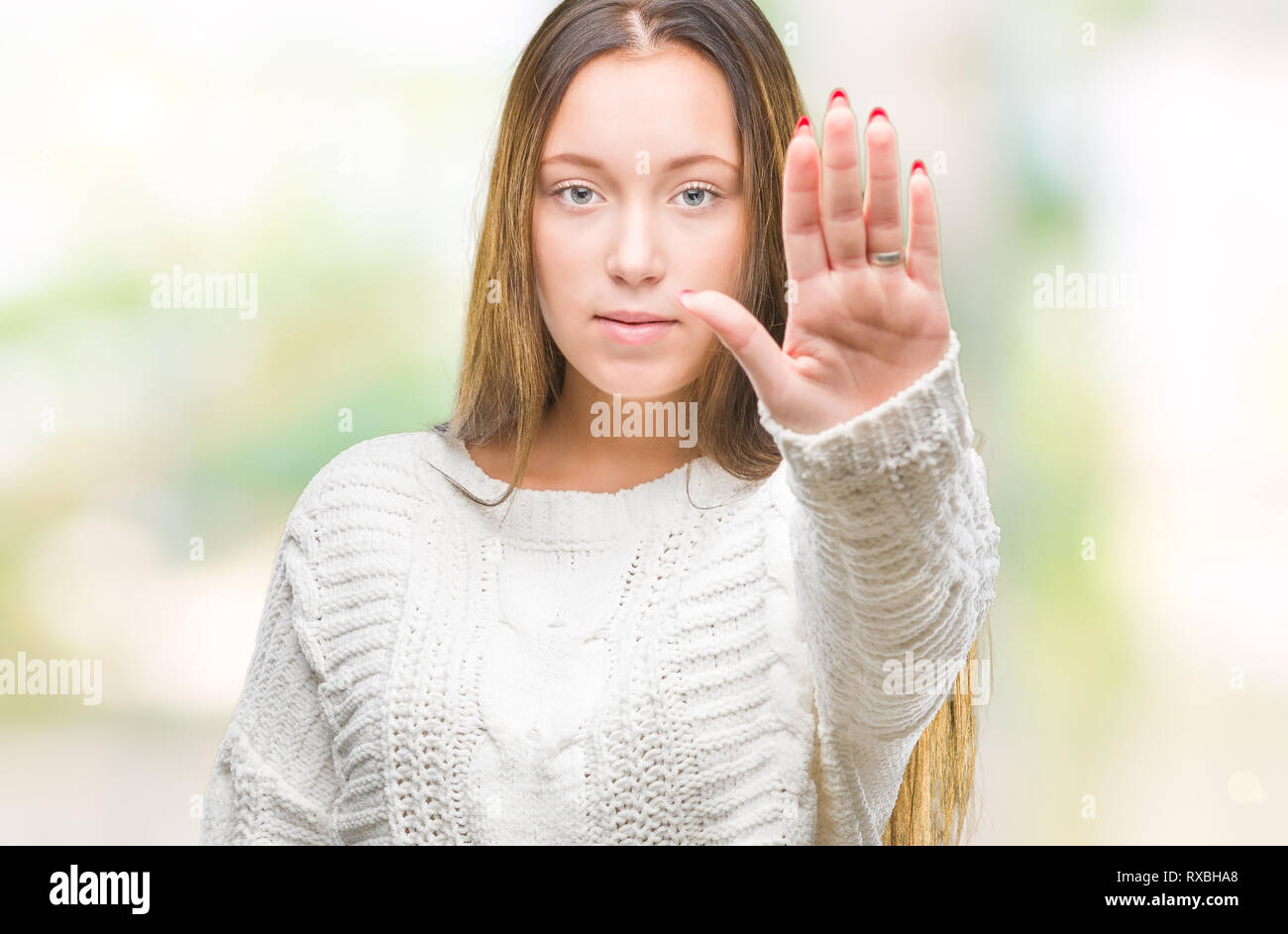 Young beautiful caucasian woman wearing winter sweater over isolated ...