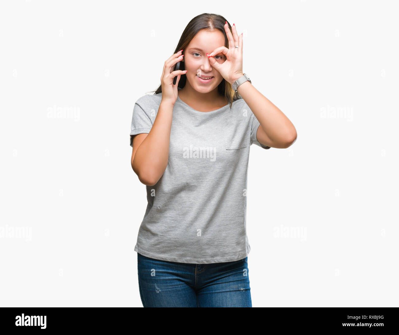 Young beautiful caucasian woman talking on smartphone over isolated ...
