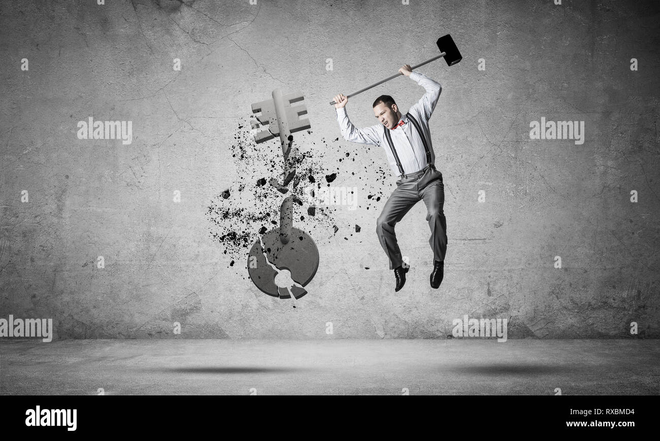 Breaking through access concept with furious man in room crashing ...