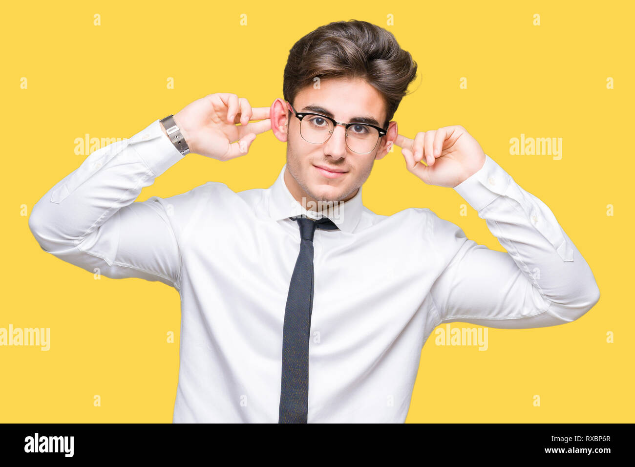 Young business man wearing glasses over isolated background Smiling ...