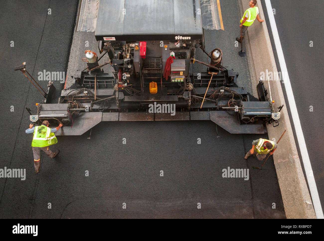 Asphalt application on an express road. Paver in action . top view on ...
