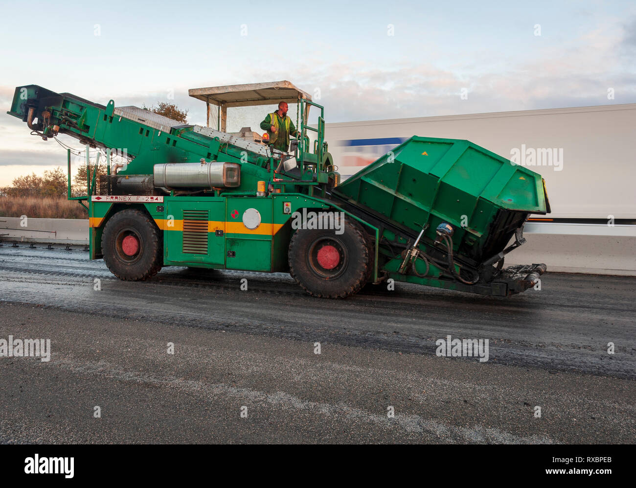 Asphalt material transfer vehicle hi-res stock photography and images ...