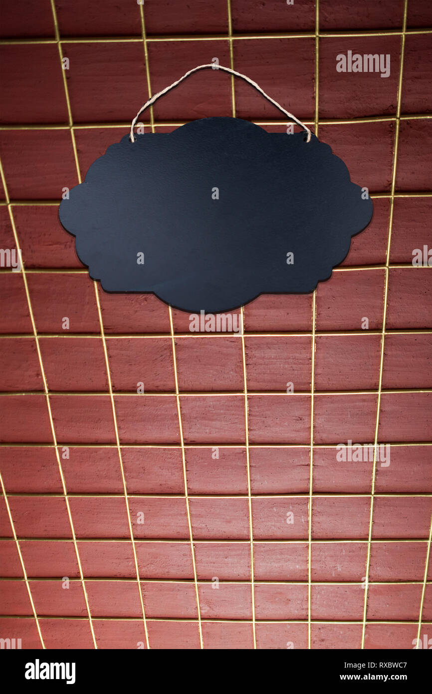 Black Empty Sign Board with string for hanging on wall Stock Photo - Alamy