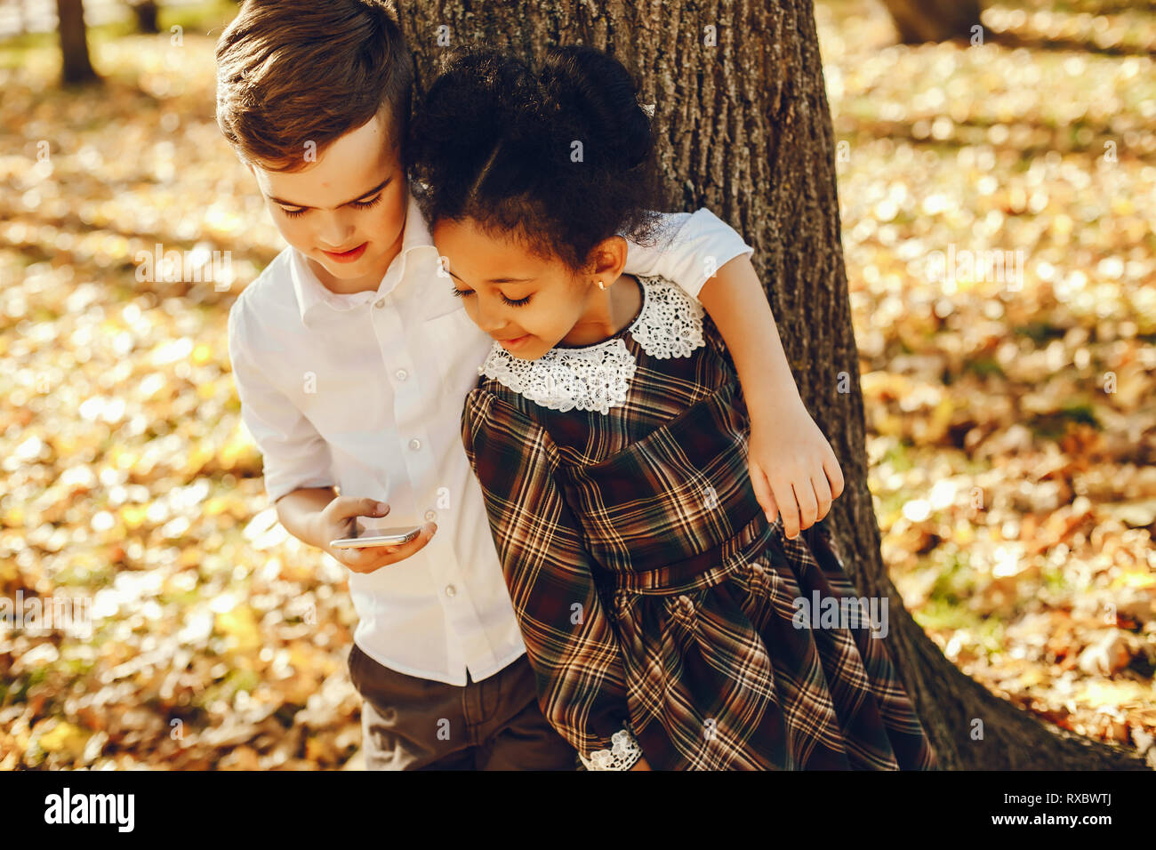 children in a park Stock Photo - Alamy