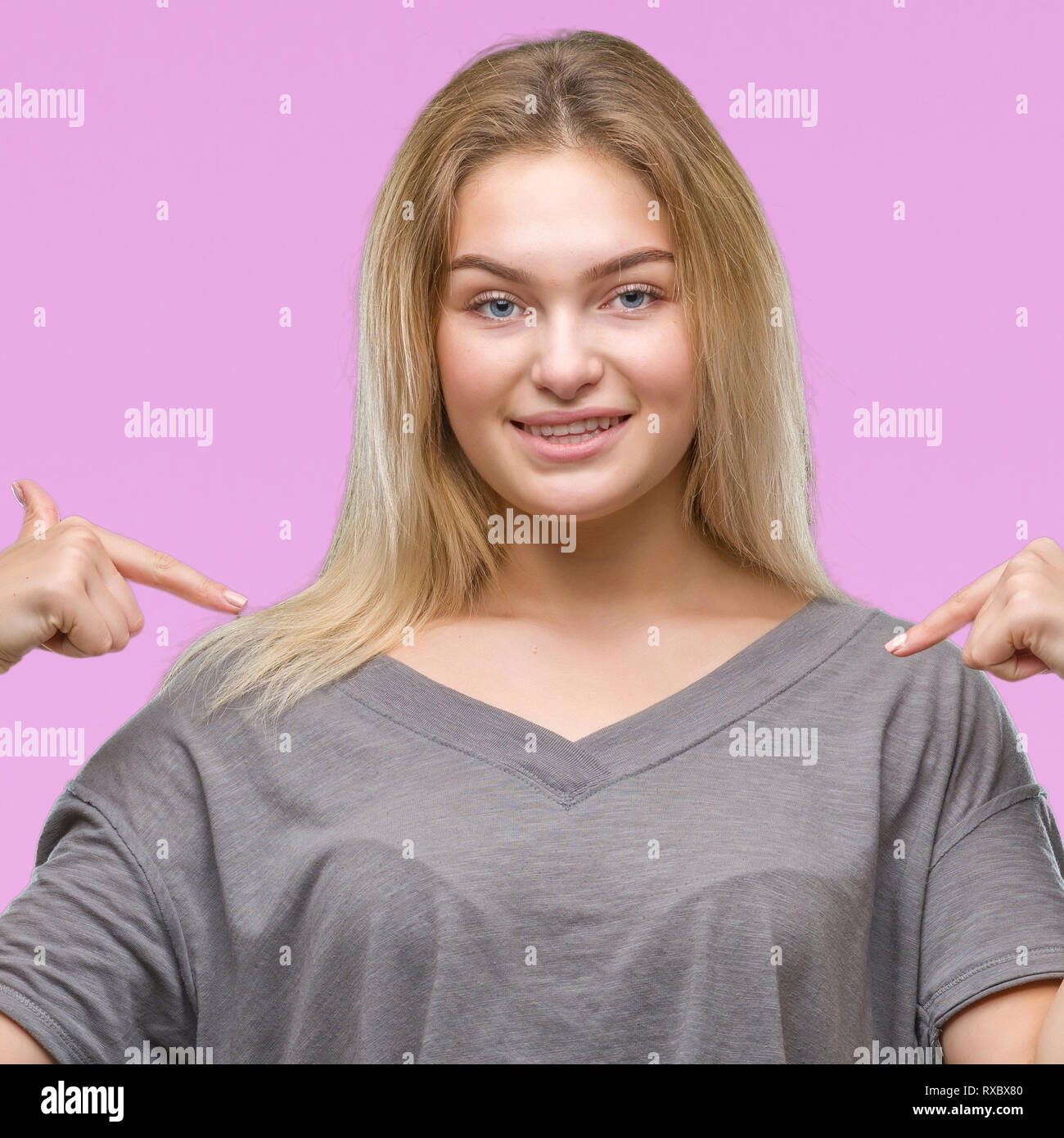 Young caucasian woman over isolated background looking confident with ...