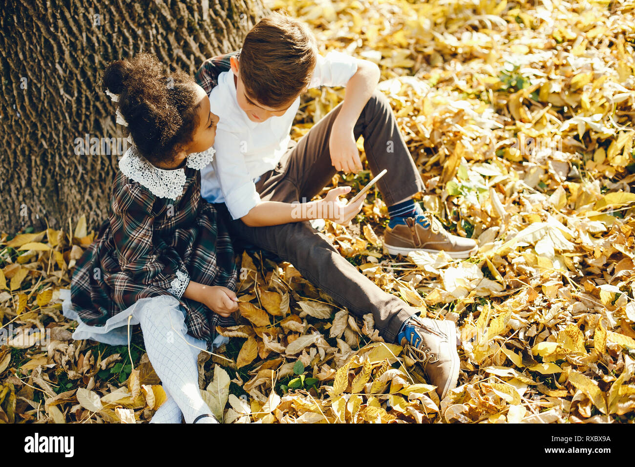 children in a park Stock Photo - Alamy