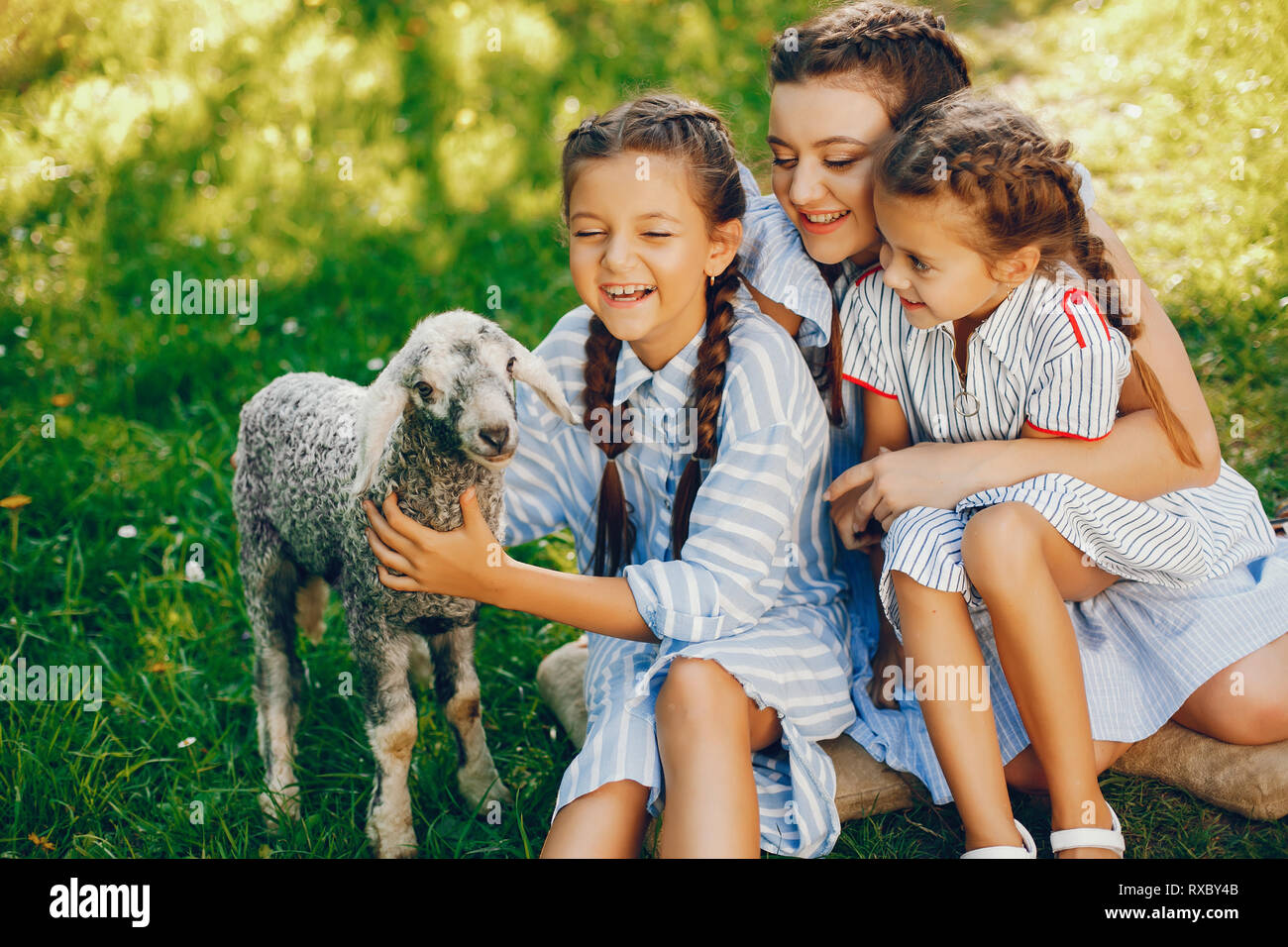 beautiful girl with goat Stock Photo - Alamy