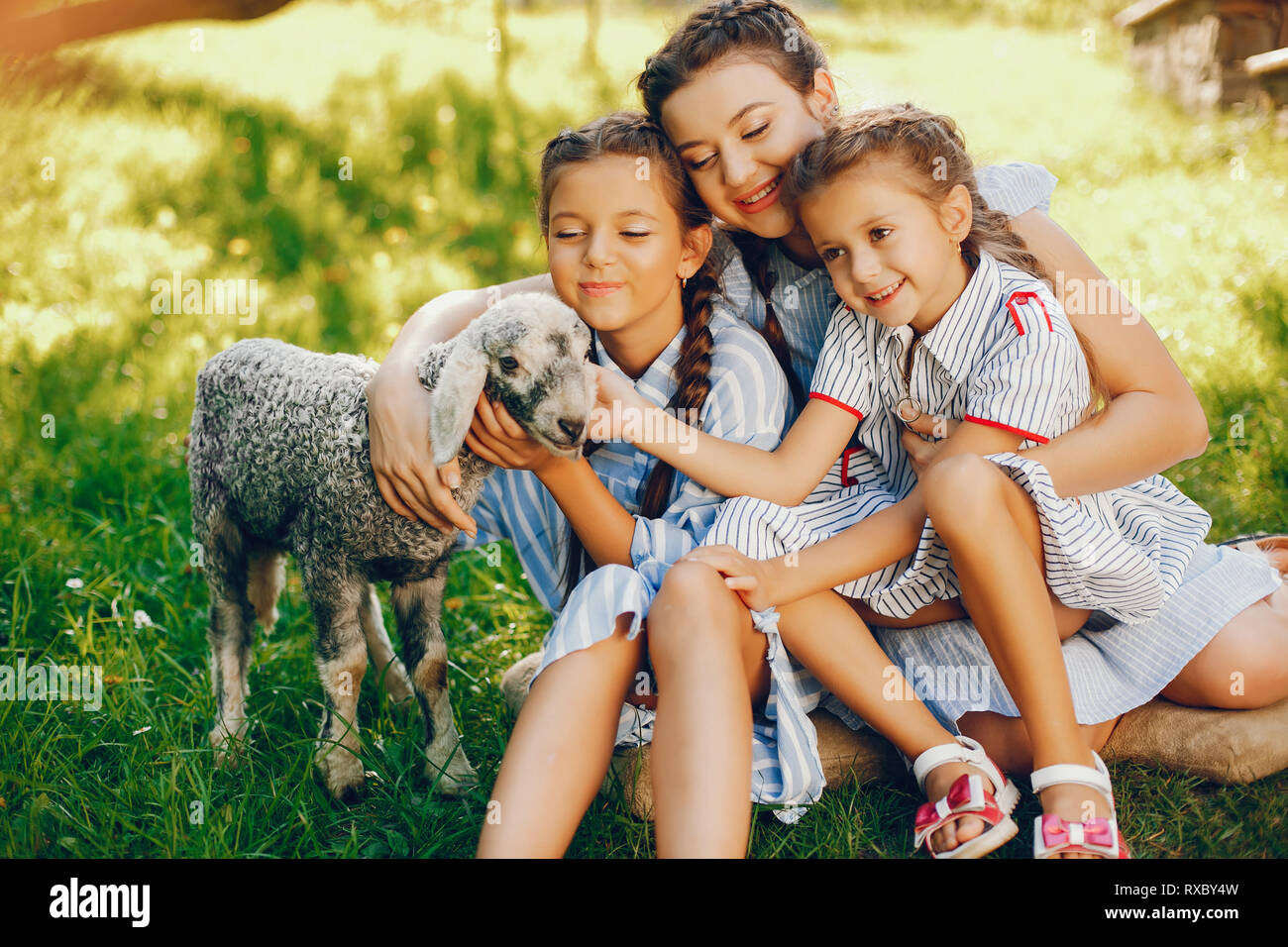 beautiful girl with goat Stock Photo - Alamy