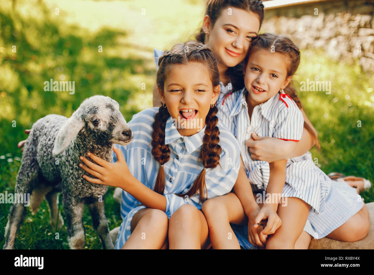beautiful girl with goat Stock Photo - Alamy