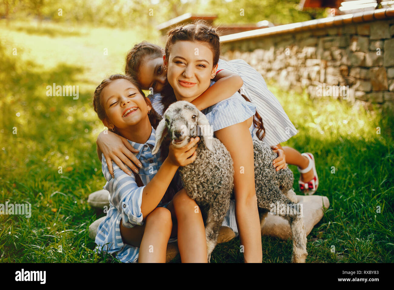 beautiful girl with goat Stock Photo - Alamy