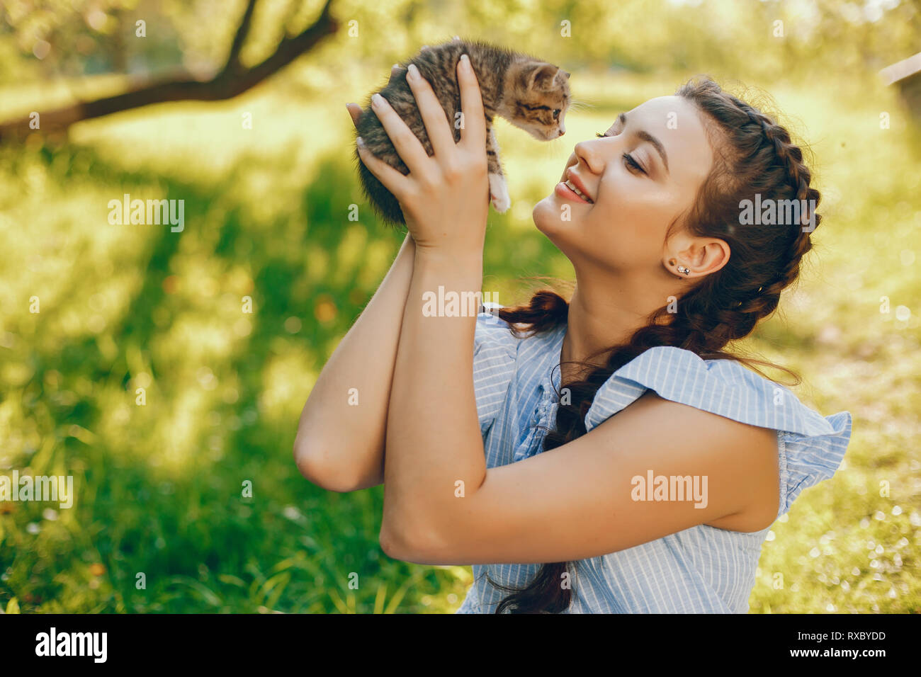 beautiful girl with cats Stock Photo - Alamy