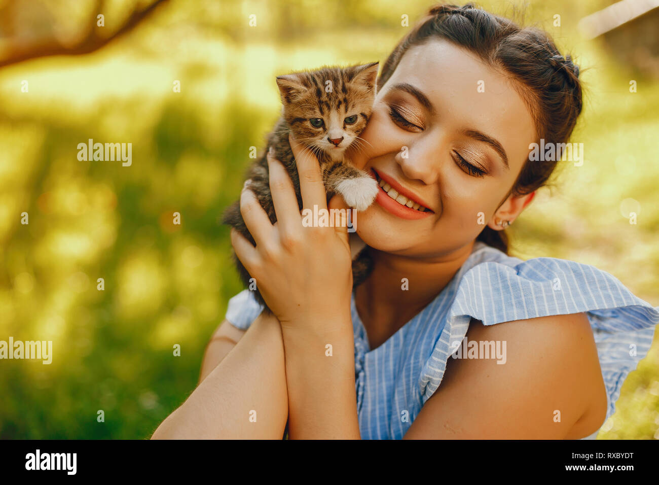 beautiful girl with cats Stock Photo - Alamy