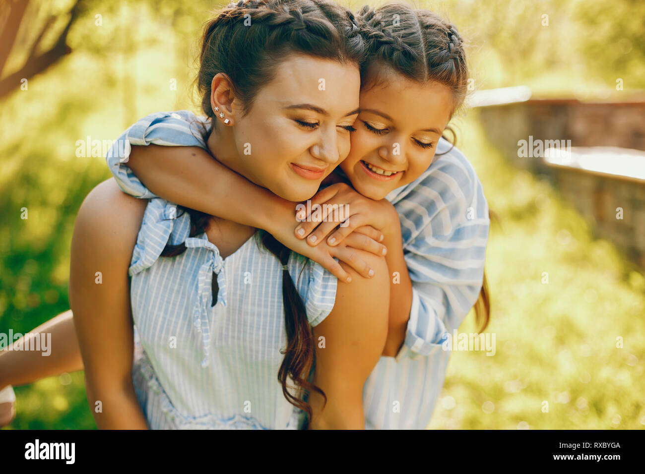 beautiful mother with pretty daughter Stock Photo - Alamy