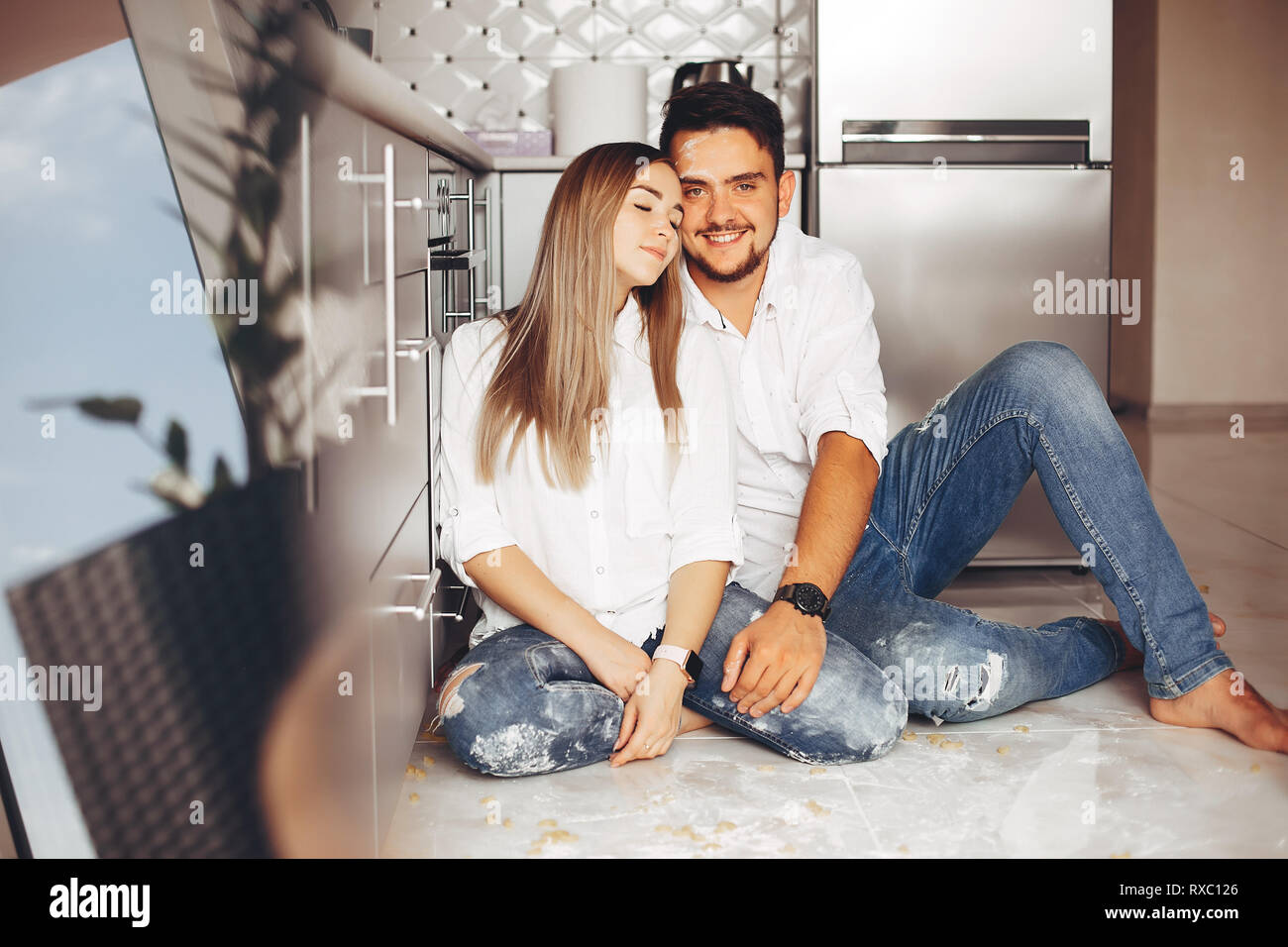 Beautiful couple at home Stock Photo - Alamy