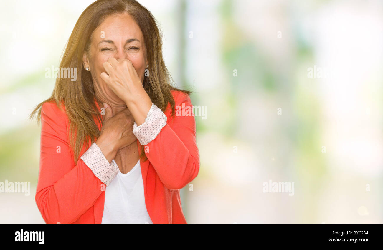 Beautiful middle age business adult woman over isolated background ...