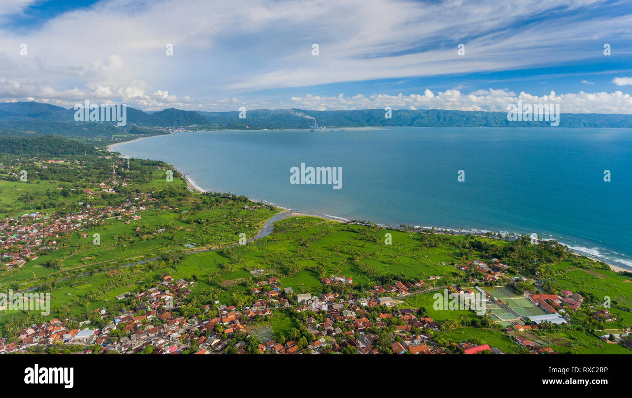 Pelabuhan Ratu (also known as Palabuhan Ratu) Bay with its rice fields ...