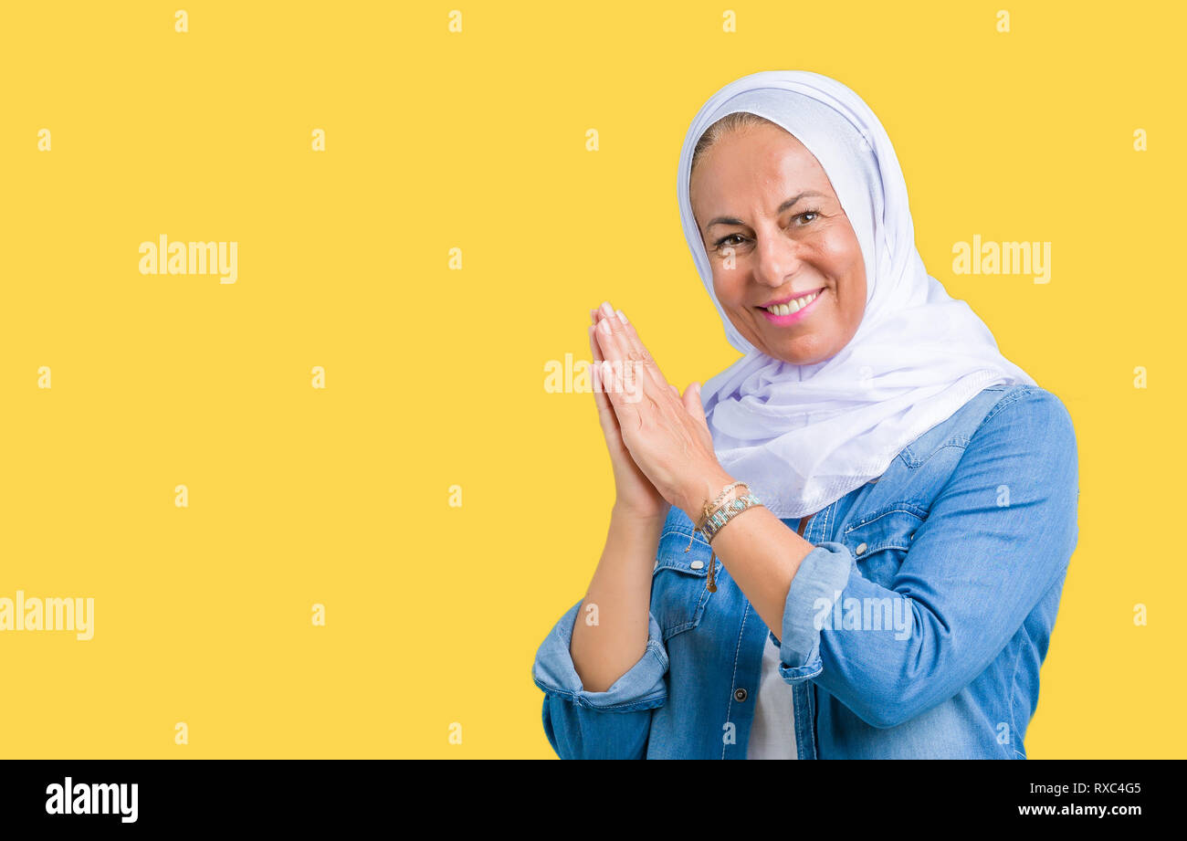 Middle age eastern arab woman wearing arabian hijab over isolated ...