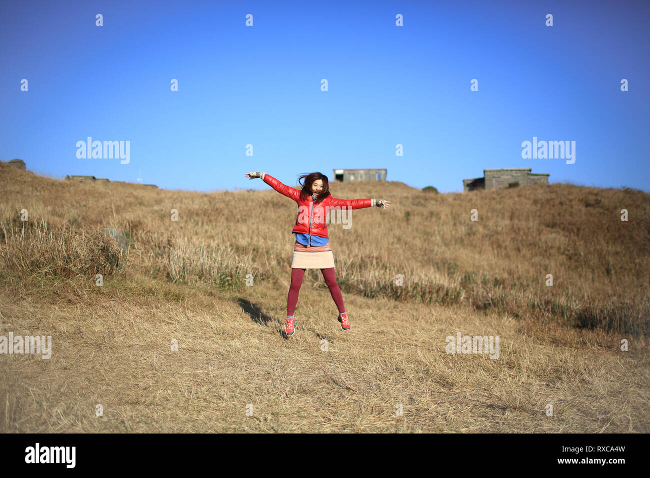 confidence woman jump Stock Photo - Alamy