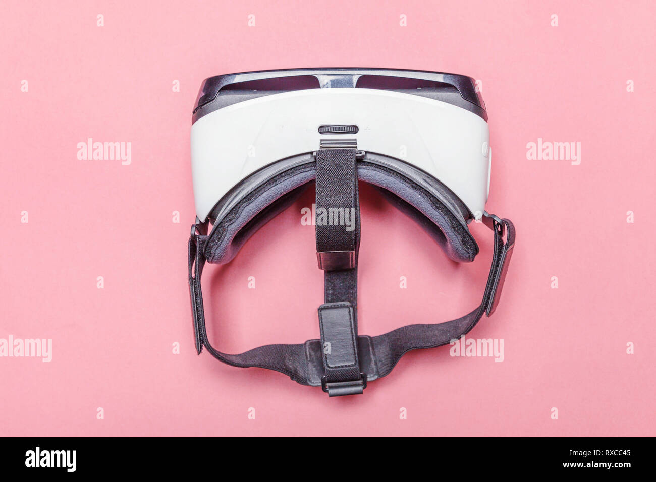 Minimal simple flat lay with virtual reality VR glasses helmet headset ...