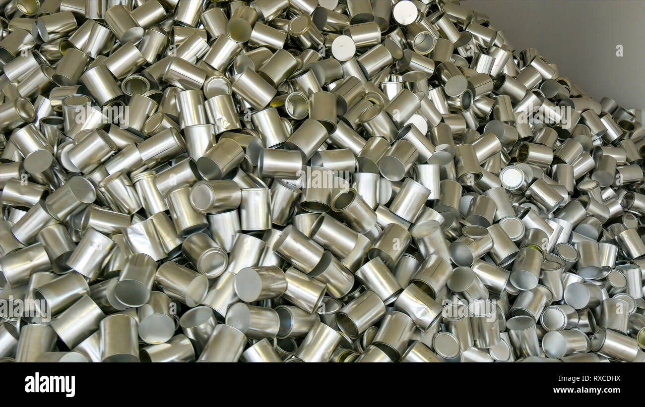 A heap of tin cans in the room. The silver tin cans are used for ...