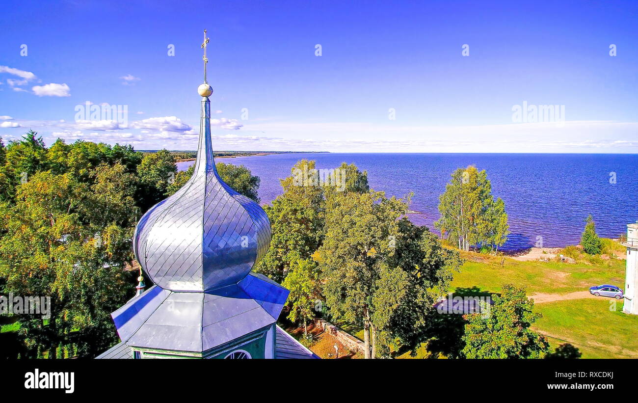 Landscape view of the lake fronting the church in Peipsi Estonia Stock ...