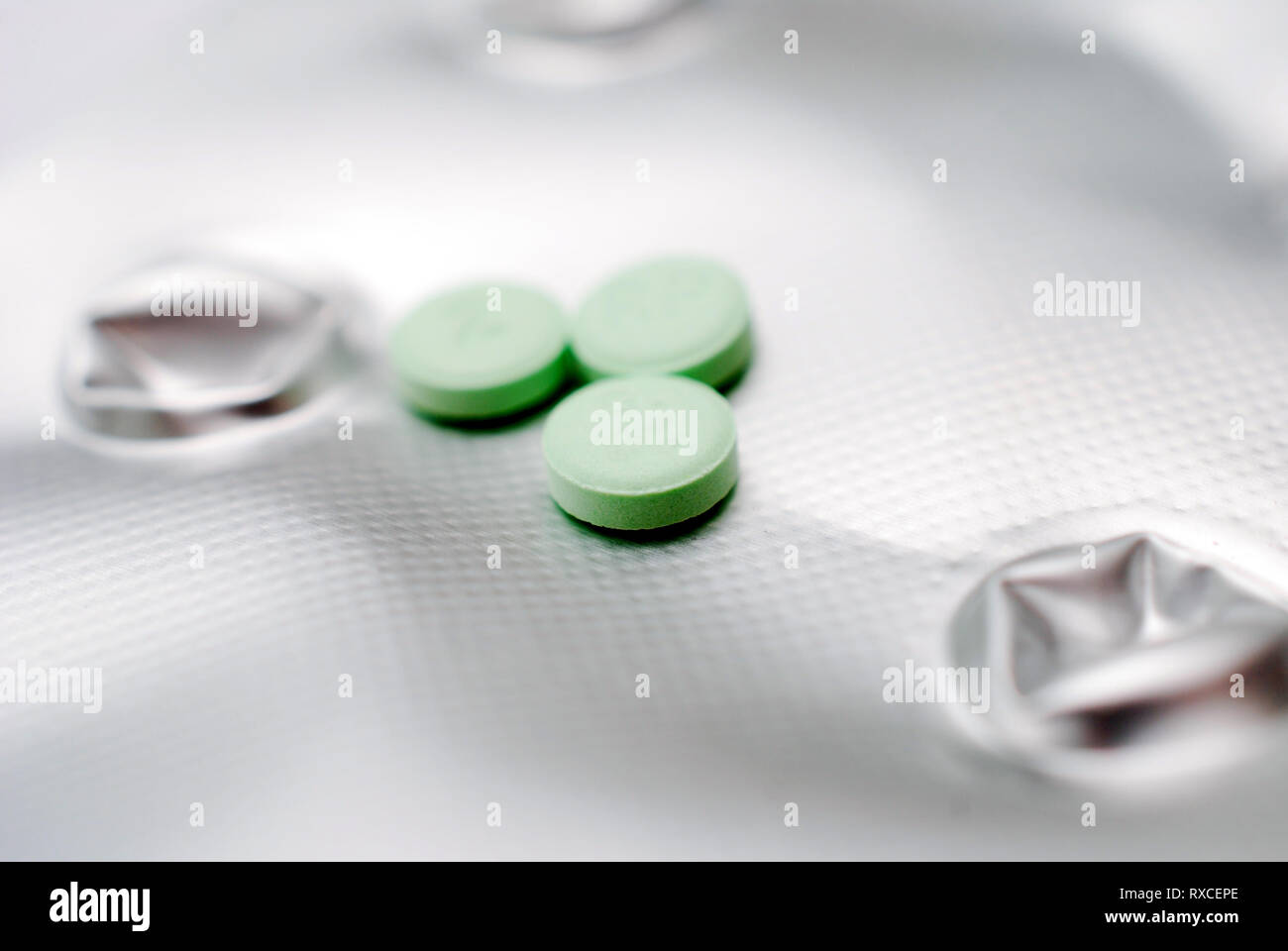 green antidepressant pills on blister packaging image Stock Photo - Alamy