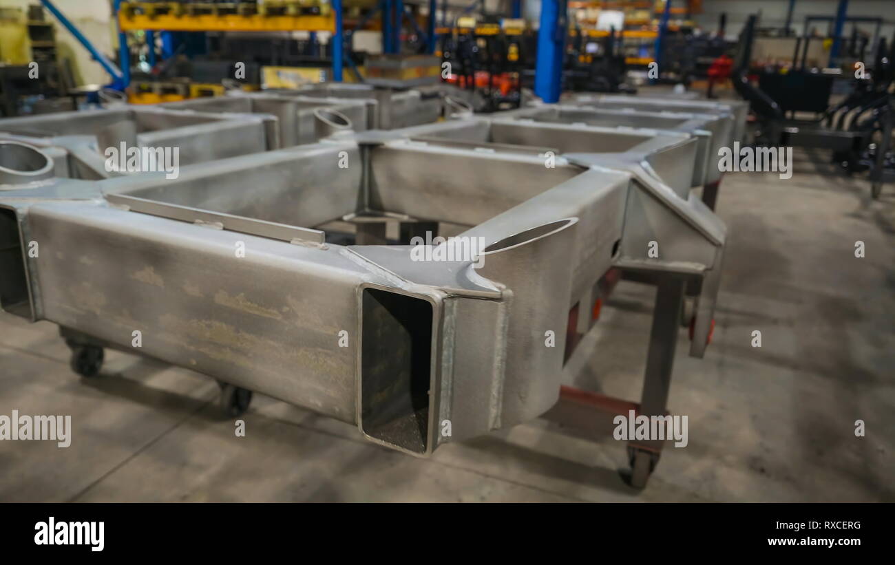 Two metal products on top of the cart inside the steel factory Stock ...